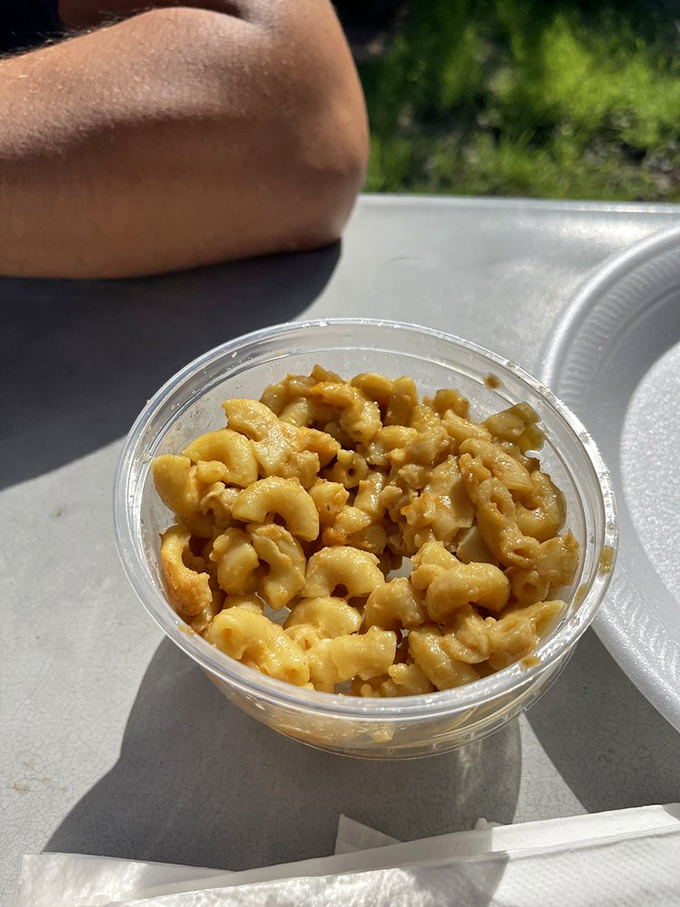 Mac and cheese this golden should come with its own spotlight – it's practically glowing with dairy perfection.