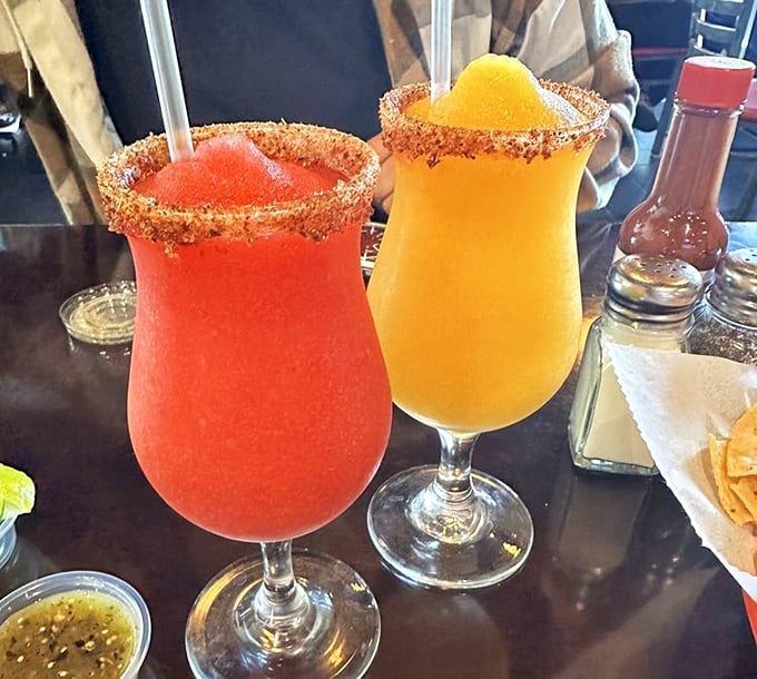 These vibrant margaritas aren't just drinks—they're vacation in a glass, complete with chili-salt rims that wake up your taste buds.