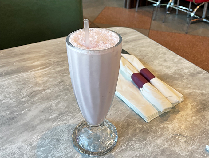 This isn't just a milkshake—it's a frothy monument to dairy perfection that demands both a straw and a spoon.