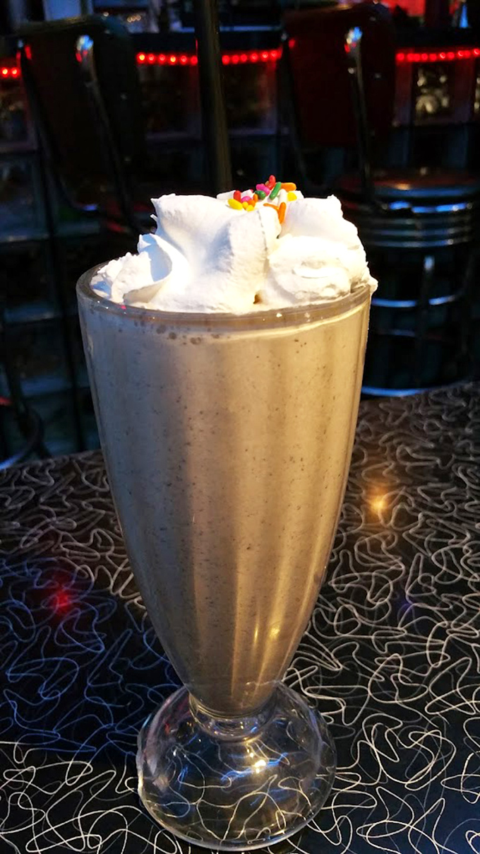 This isn't just a milkshake; it's a creamy spacecraft delivering joy directly to your taste buds. Those sprinkles? They're the stars.