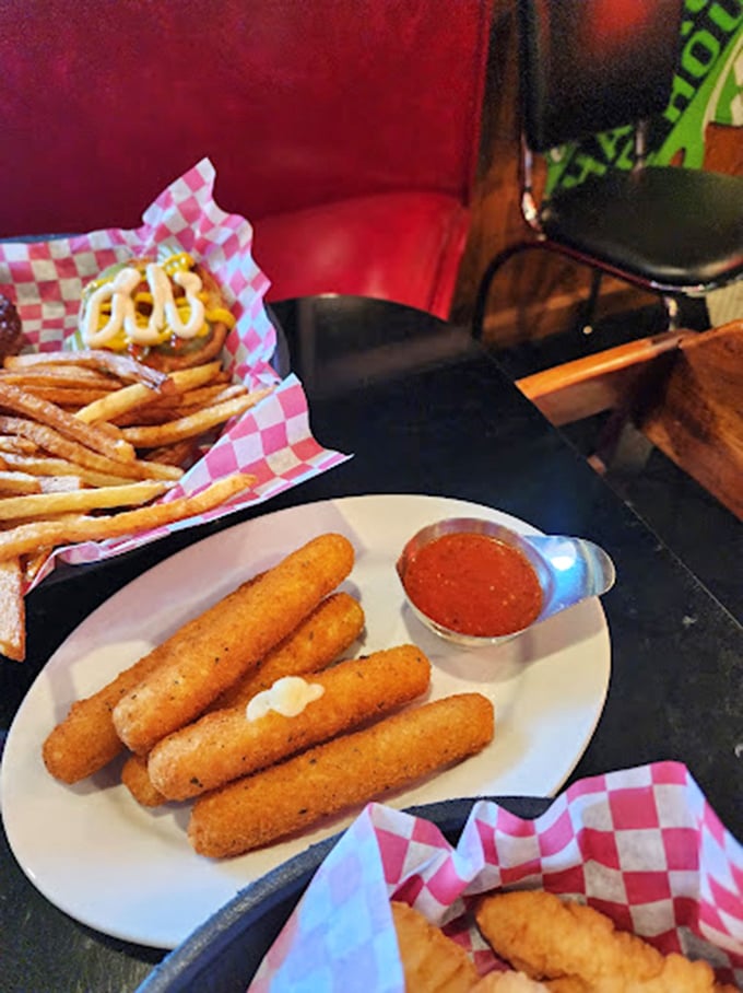 Comfort food that requires no translation: golden-brown mozzarella sticks with marinara sauce. The universal language of fried cheese.
