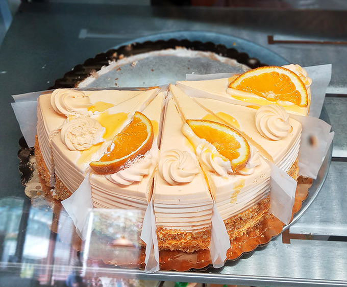 This orange cheesecake looks like it graduated from dessert college with honors—creamy, bright, and ready for its close-up on any social media platform.