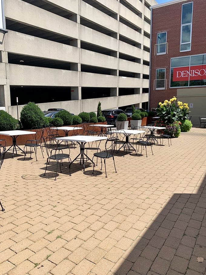 The outdoor seating area offers a moment of tranquility amid the urban landscape—the perfect stage for your upcoming sandwich performance.