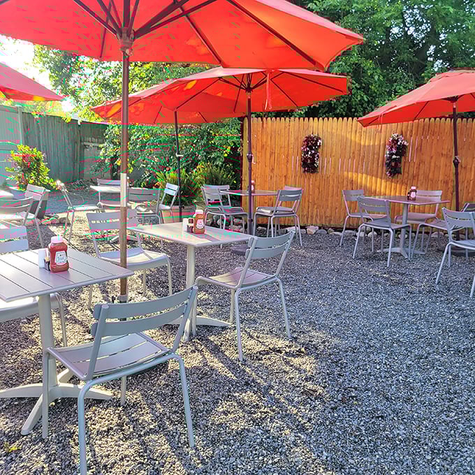 Those coral umbrellas aren't just for show—they're sheltering serious food conversations and coffee refills in Lancaster's fresh air.