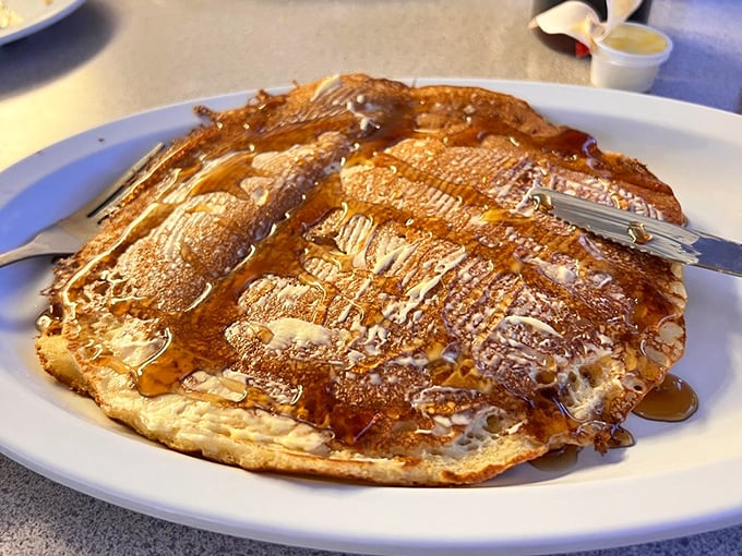Pancake perfection is measured in golden-brown real estate and syrup absorption capacity. This one scores a perfect 10 on both counts.