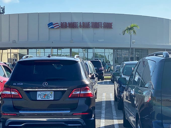 Even the parking lot tells a story – luxury cars next to practical sedans, proving great deals attract shoppers from every economic bracket.