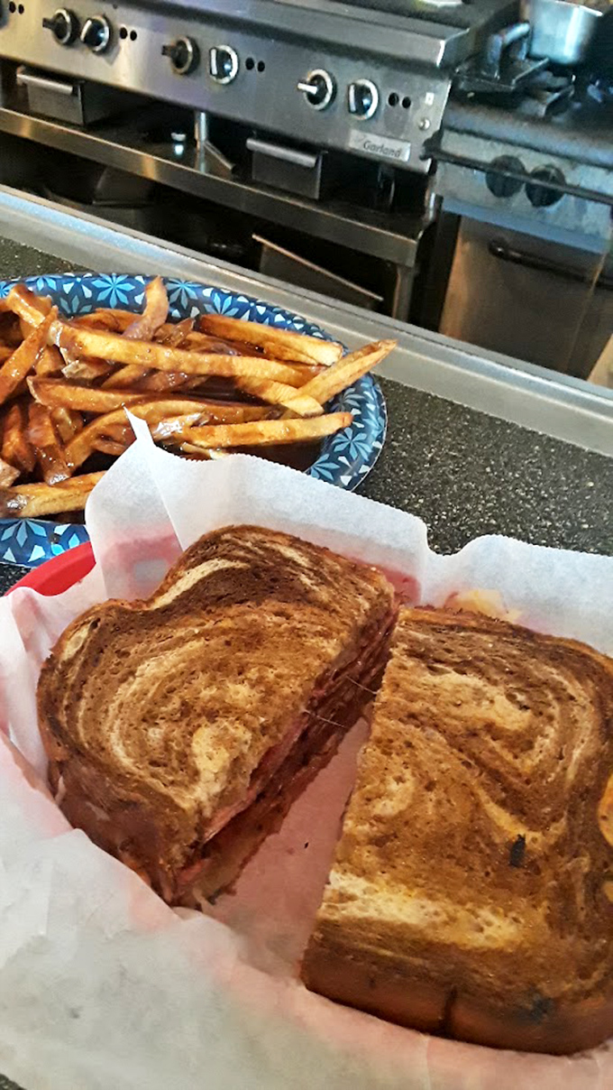 This grilled sandwich with fries isn't just lunch – it's edible therapy after a long morning, with melted cheese as the counselor.