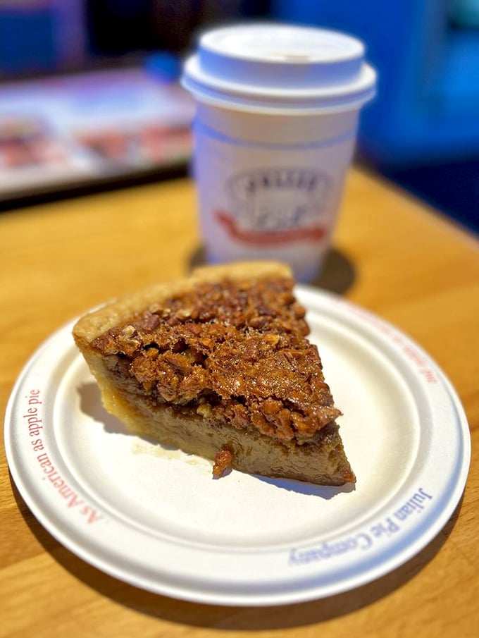 Pecan pie that would make a Southerner weep with joy, served with coffee in that quintessential small-town bakery setting.