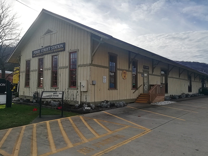 Perry Street Station stands as a charming reminder that the journey matters as much as the destination—especially when train tickets cost less than big city parking.