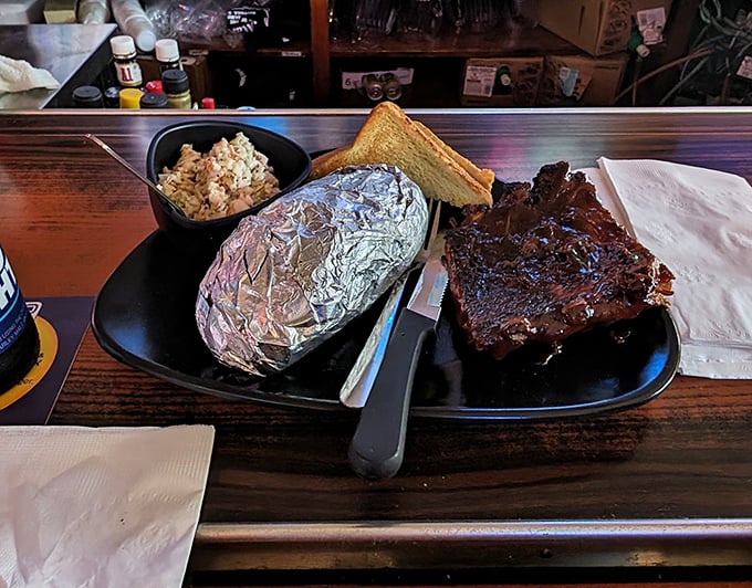 These ribs aren't trying to win beauty contests—they're too busy falling off the bone and making you forget your table manners ever existed.