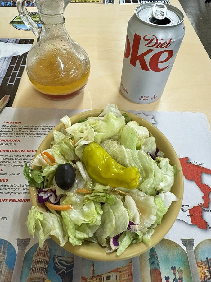 The Italian salad—a crisp, refreshing counterpoint to all that pizza. It's not the star, but every great show needs a solid opening act.