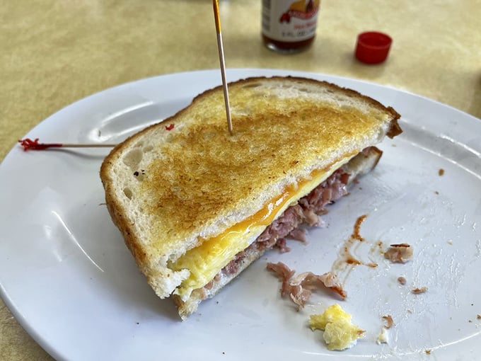The humble ham and egg sandwich—proof that sometimes the simplest combinations create the most profound breakfast experiences.