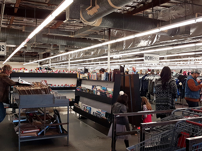 Books and bargains bring shoppers together in a community of treasure hunters, each cart telling its own story of found gems.