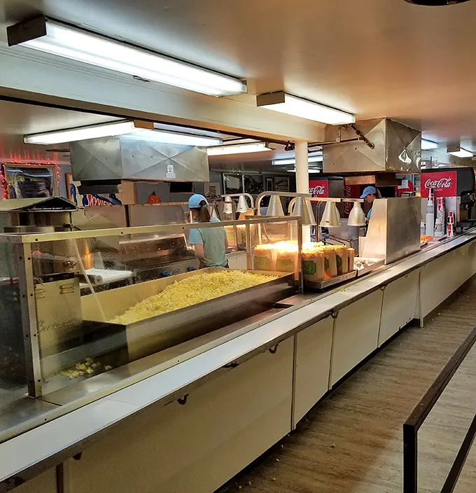Popcorn paradise in its natural habitat. The concession stand's massive popper ensures no moviegoer faces the horror of butter deficiency.