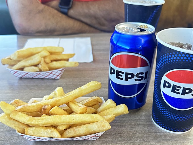 Golden fries and ice-cold Pepsi—the Fred Astaire and Ginger Rogers of lunch combos. They've been dancing together for generations.