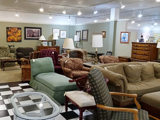 The furniture showroom feels like visiting a stylish friend's living room—if that friend collected sofas from every decade since 1950.