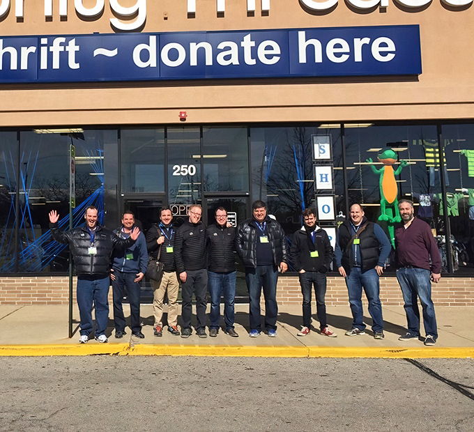 Community supporters gather outside the store, proving that thrifting isn't just shopping—it's a movement with passionate advocates.