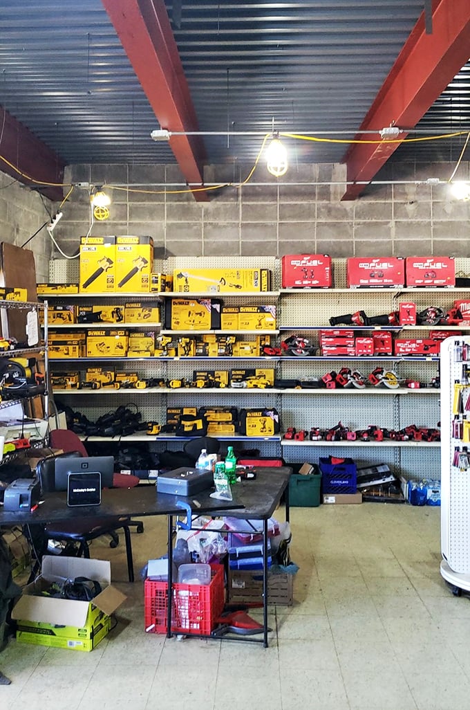 Tool heaven! This DeWalt and Milwaukee display would make Tim Allen grunt with approval—a handyman's dream tucked inside a flea market. 