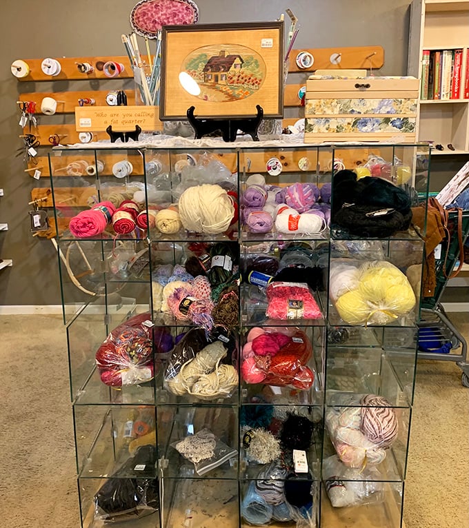 A crafter's dream! These cubbies of colorful yarn hold unlimited potential—future scarves, sweaters, and projects that might actually get finished this time.