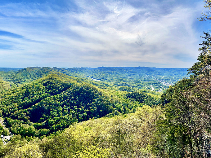 Mother Nature's masterpiece unfolds at Cumberland Gap, where three states meet and a million shades of green paint the valleys below.