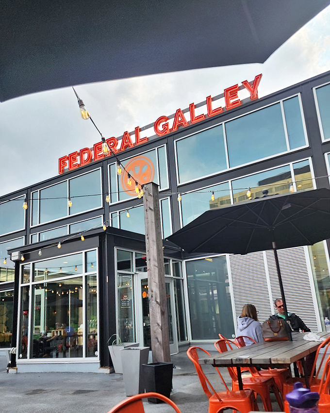 Those orange chairs aren't just seating—they're front-row tickets to Pittsburgh's BBQ evolution.