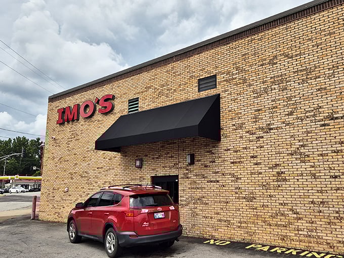 Imo's brick fortress houses the controversial delight that divides pizza lovers—that cracker-thin crust and Provel cheese that screams "St. Louis!"
