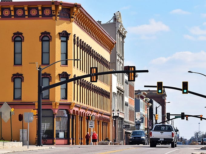 Brightly painted historic buildings bring charm to downtown Muncie, where local shops and welcoming streets create a warm community atmosphere.