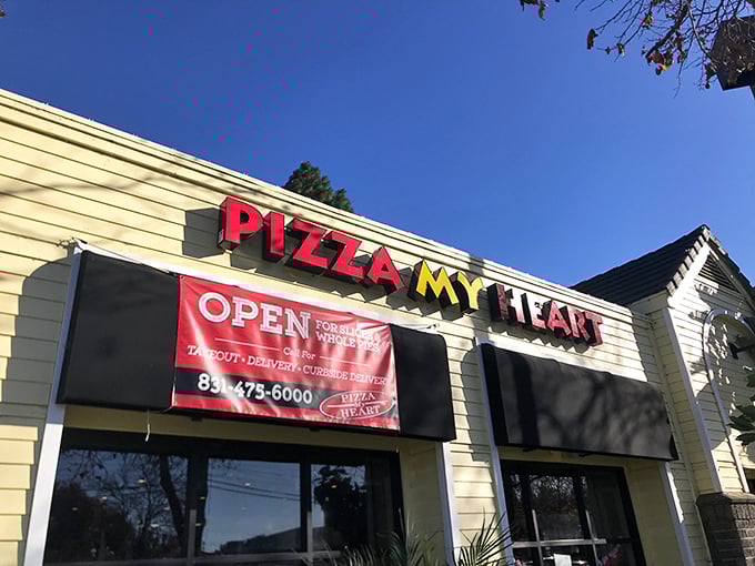 Pizza My Heart wears its surf culture proudly on its sunny yellow walls. Beach vibes and East Coast slices create California pizza perfection.