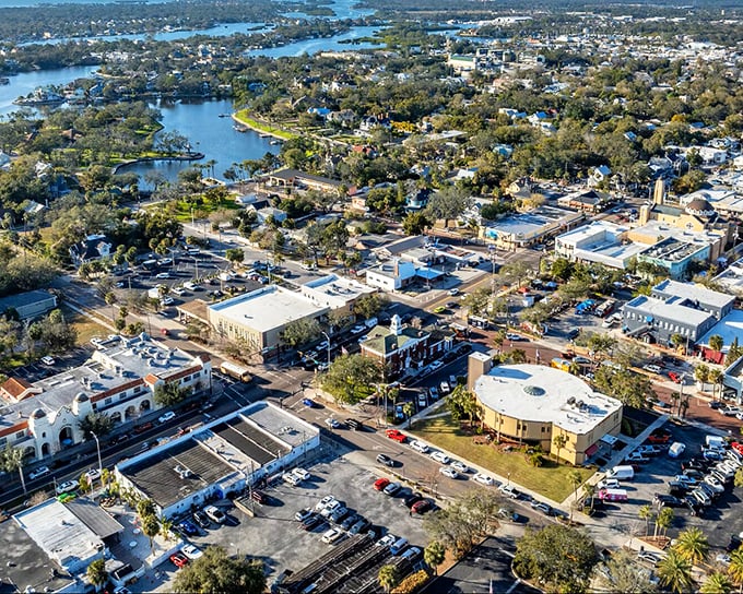 From above, Tarpon Springs reveals its vibrant downtown and winding waterways. Palm trees and Greek charm guide the way in this coastal gem.