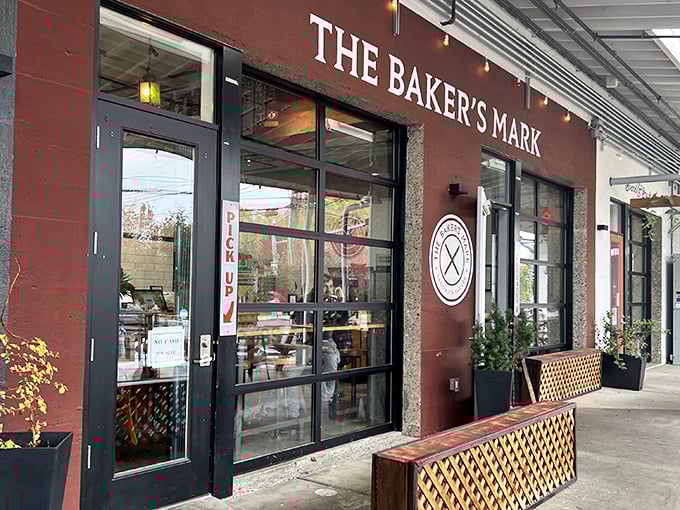 The Baker's Mark's sophisticated storefront promises sandwiches with substance—where bread isn't just a vehicle, it's the star.