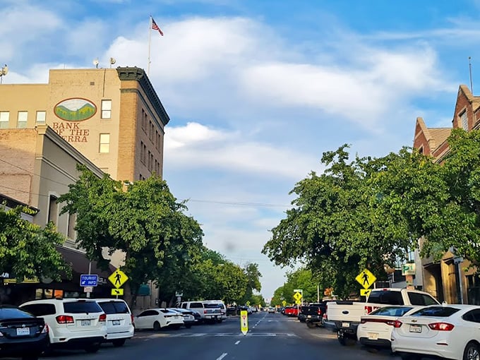 Visalia's downtown buildings stand like well-preserved time capsules. Bank of the Sierra watches over streets where parking isn't an extreme sport.