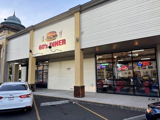 Nestled in a modern shopping center, this retro time machine serves up breakfast classics with a side of nostalgia.