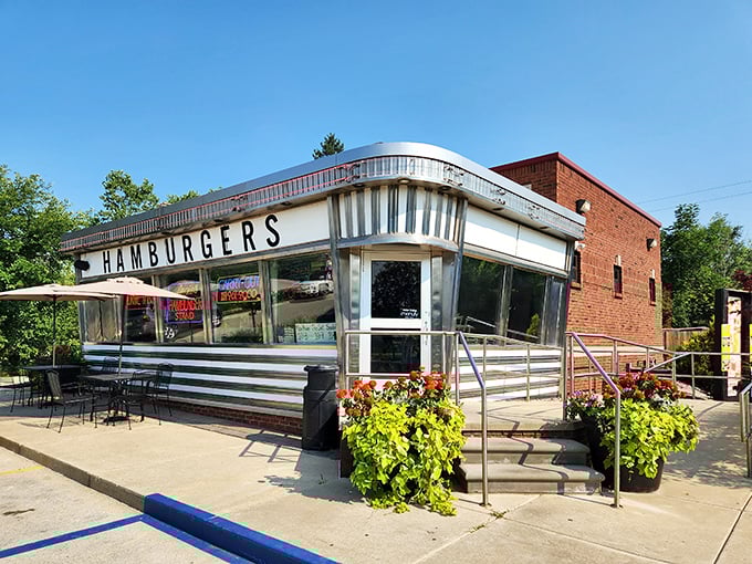 Summer flowers frame Angie's chrome-trimmed burger stand perfectly. This is what burger dreams looked like in the 1950s—and still do today.