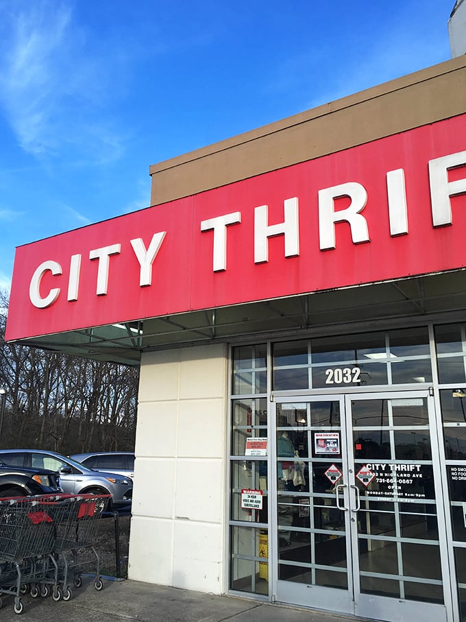 The bold CITY THRIFT sign doesn't whisper—it announces a wonderland of pre-loved treasures waiting to be discovered.
