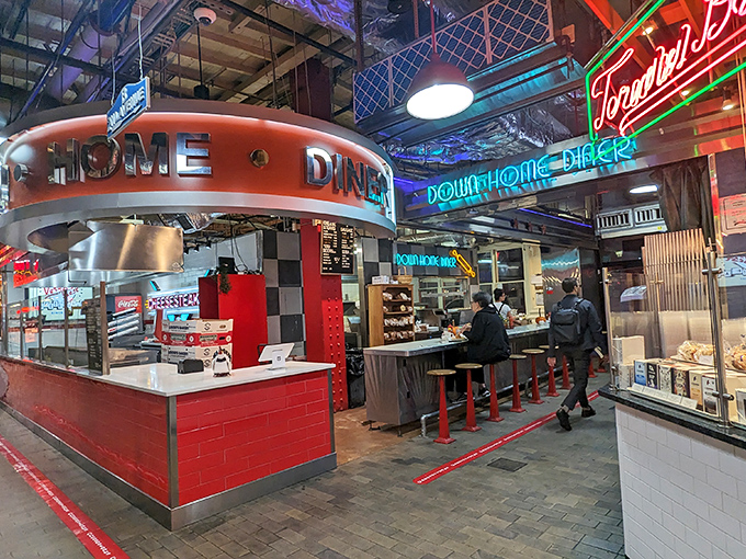 Neon lights and stainless steel create that perfect retro vibe at Down Home Diner in Reading Terminal Market.
