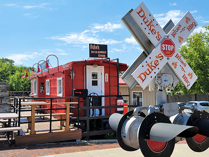 That windmill sign isn't just eye-catching—it's Duke's way of saying "this isn't your ordinary BBQ joint."