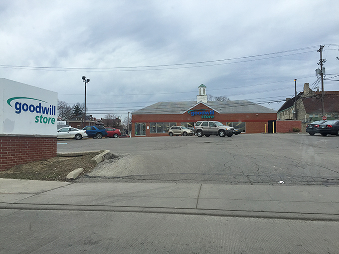 The parking lot view reveals Goodwill's substantial footprint—a kingdom of secondhand treasures awaiting exploration.