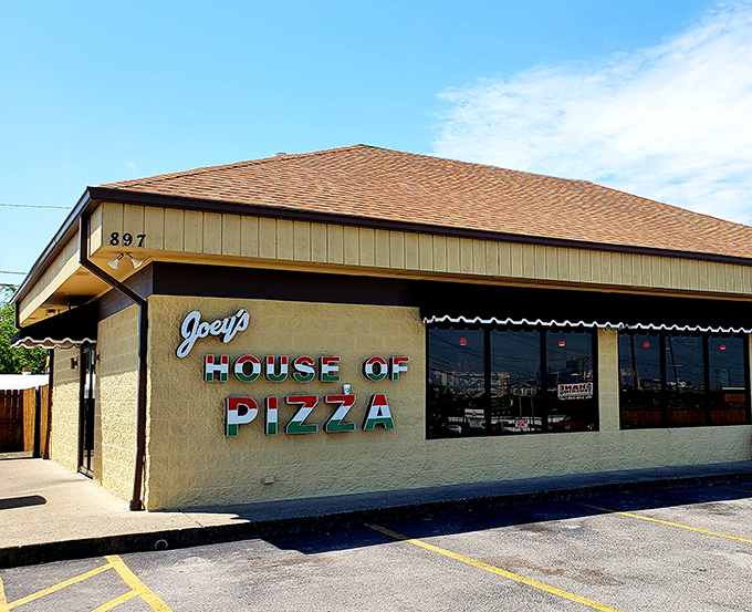 Don't let the plain exterior fool you – Joey's House of Pizza is hiding authentic New York slices inside those walls.