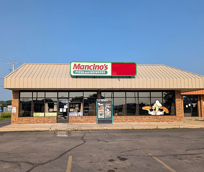 Sunny day, simple building, extraordinary pizza – Mancino's proves great food doesn't need fancy packaging to shine.