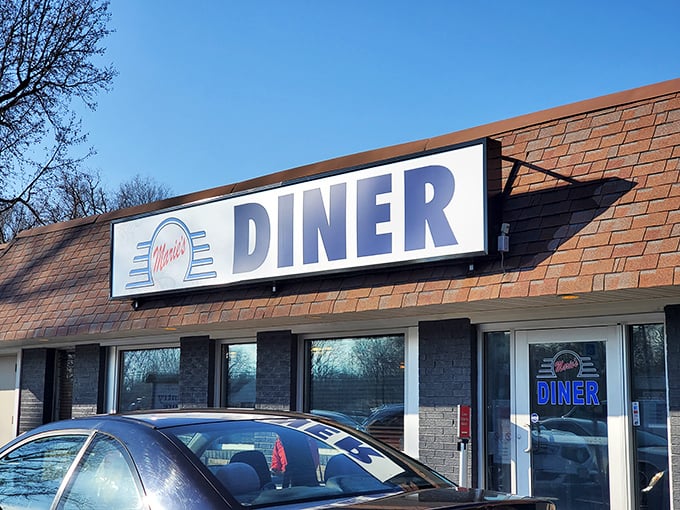 Marie's Diner (exterior with sign): "Where Southern Maryland meets good old-fashioned breakfast magic. The pancakes are lighter than your grandkid's latest phone."