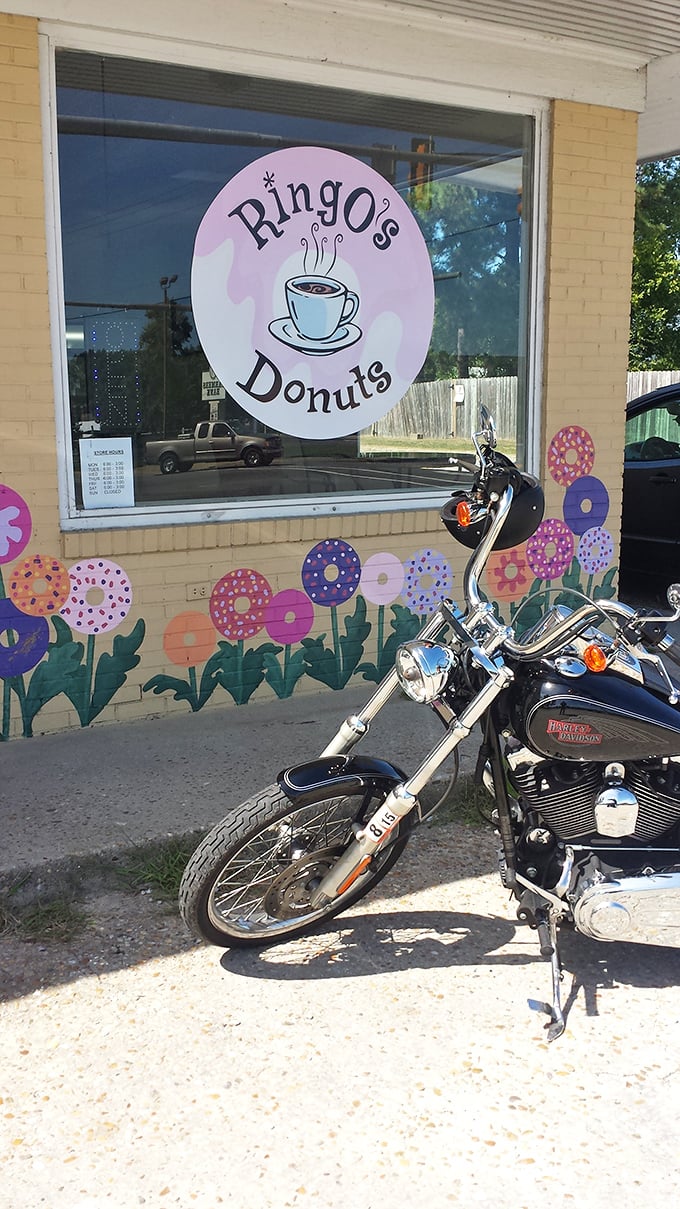 That pink logo and hand-painted donut garden create the happiest storefront in Smithfield. Even the motorcycle seems drawn to the sweetness!