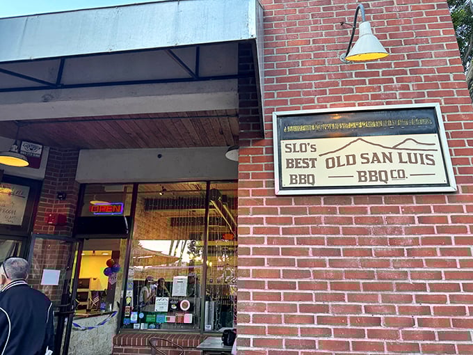 SLO's Best Old San Luis BBQ Co. – where brick walls and neon signs promise smoky delights in downtown SLO.
