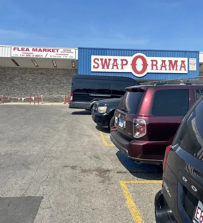 The parking lot's full for good reason—inside this blue building, yesterday's trends meet tomorrow's vintage finds in a bargain-hunter's paradise.