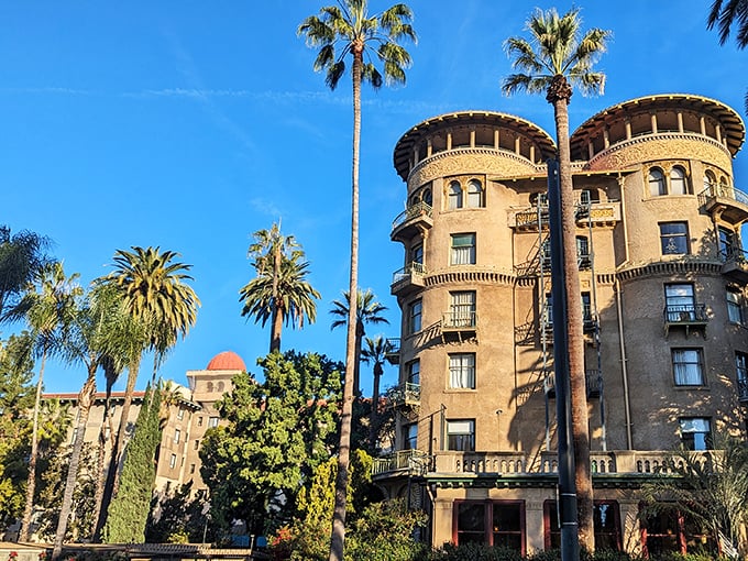 The Castle Green: Palm trees frame this Mediterranean-inspired castle, where rounded turrets and arched windows create a uniquely California palace.