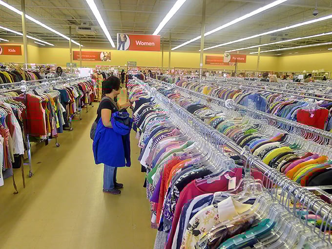 Rainbow-organized clothing racks create a color-coded treasure map that makes finding that perfect blouse surprisingly satisfying.