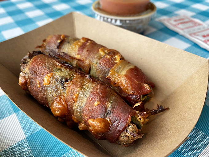 Bacon-wrapped jalapeños that make you question why all foods aren't bacon-wrapped. These little flavor bombs are what appetizer dreams are made of.