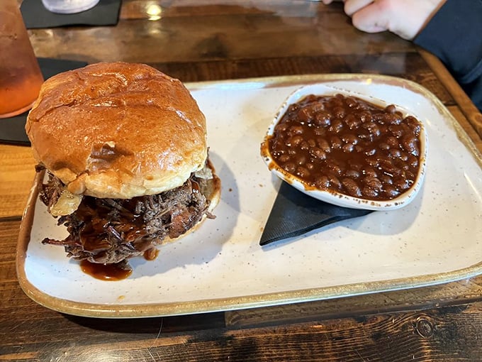 A pulled meat sandwich with baked beans that aren't just a side dish – they're making a compelling argument to be the main event.