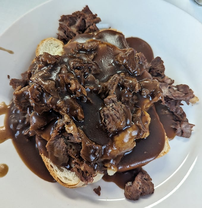 The Beef Manhattan—where meat, gravy, and bread unite in holy matrimony. A dish that proves sometimes the most beautiful things in life are the messiest.