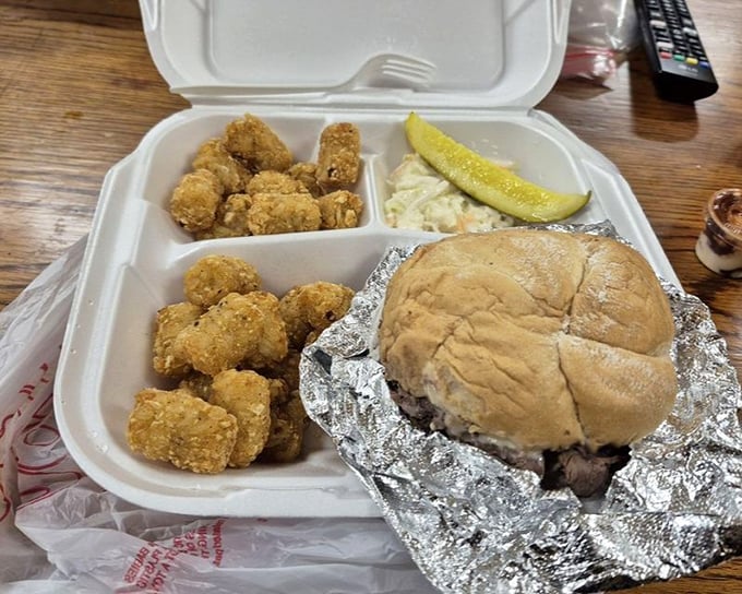 The XL Platter doesn't just feed you—it adopts you into the Beefy King family with those golden tater tots and pickle standing guard.