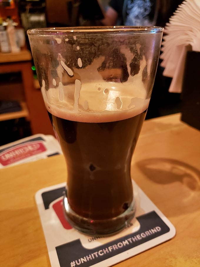 This isn't just beer—it's liquid amber contemplation in a glass. The perfect companion for pondering life's great questions, like "Should I order more poutine?"